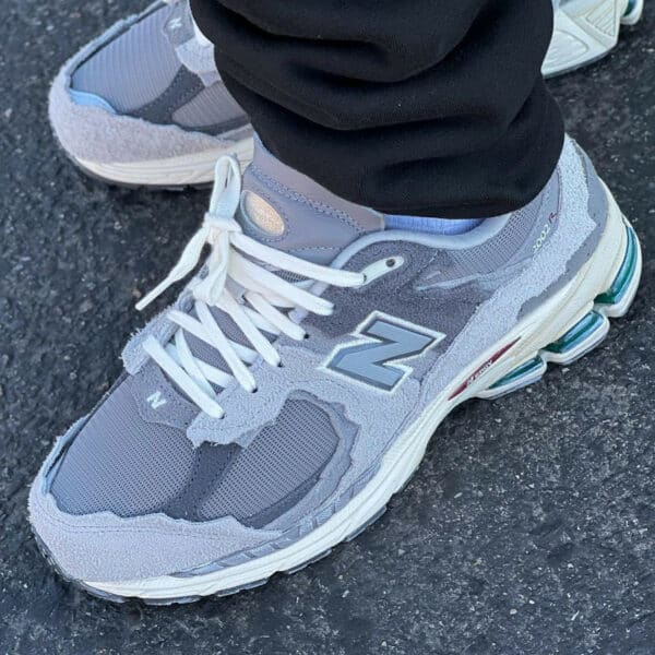 Comment portent-ils leur NB 2002R Protection Pack Refined Future